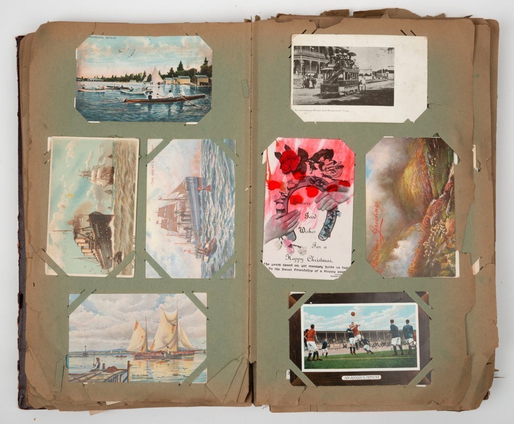 Postcard album (dilapidated) with large range of cards including ...